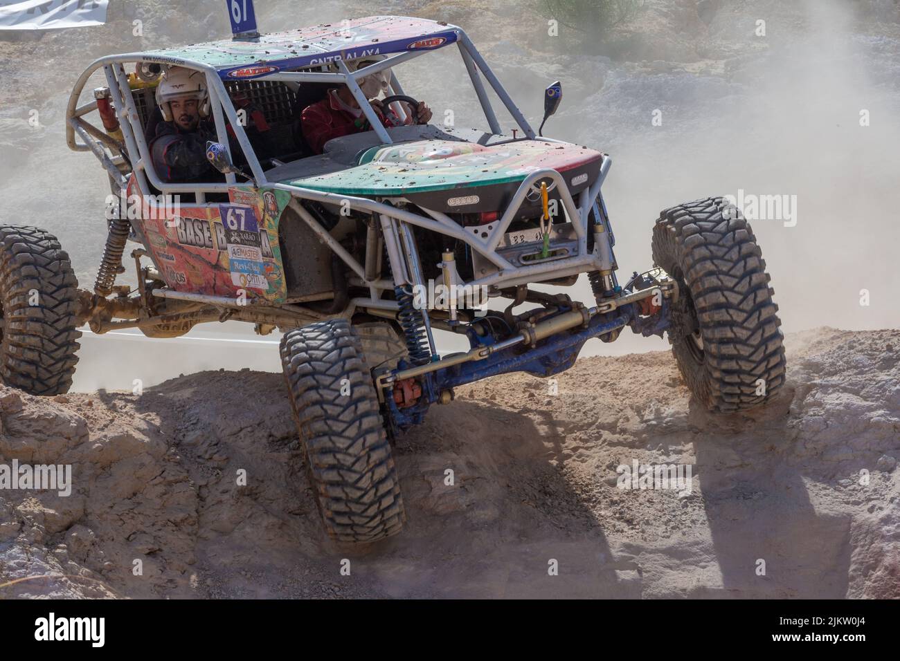 An Off-road racing car covered with mud during National All Terrain ...