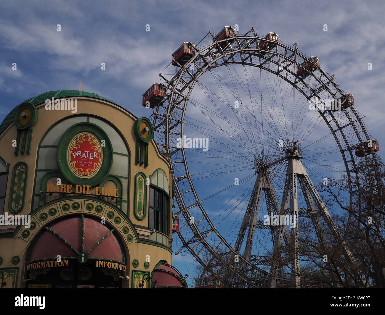 Prater entry with ferris wheel in the back, famous amusement park ...