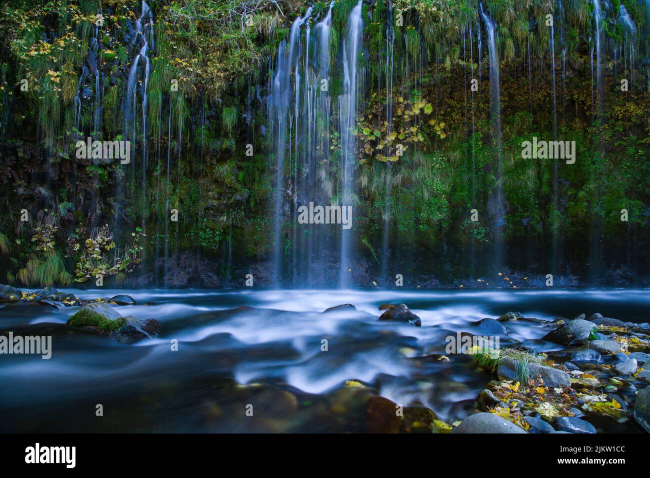 A mesmerizing view of the waterfall captured in the evening in the ...