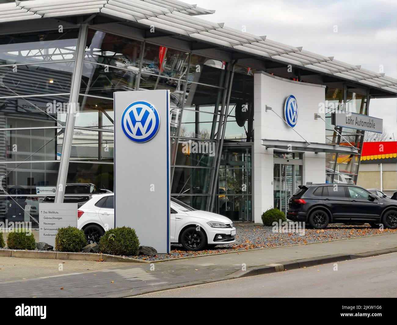 Neuwied, Germany - November 24, 2021: the VW logo of the brand "Volkswagen" at the entrance to ...