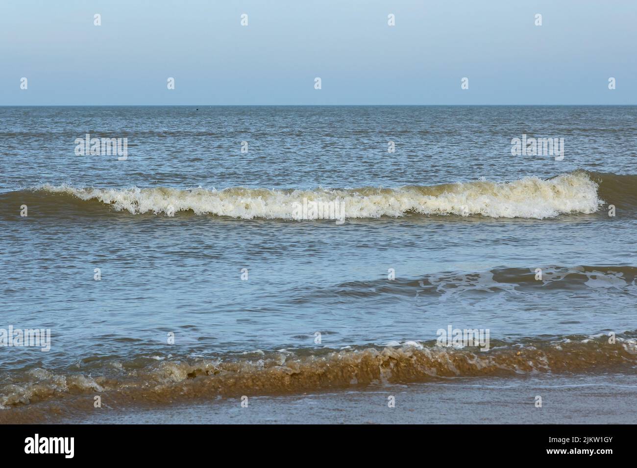 A spindrift wave close to the beach of the North Sea Stock Photo - Alamy