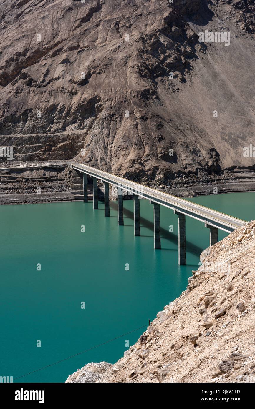 A vertical shot of a hydroelectric facility on the water in the gorge ...