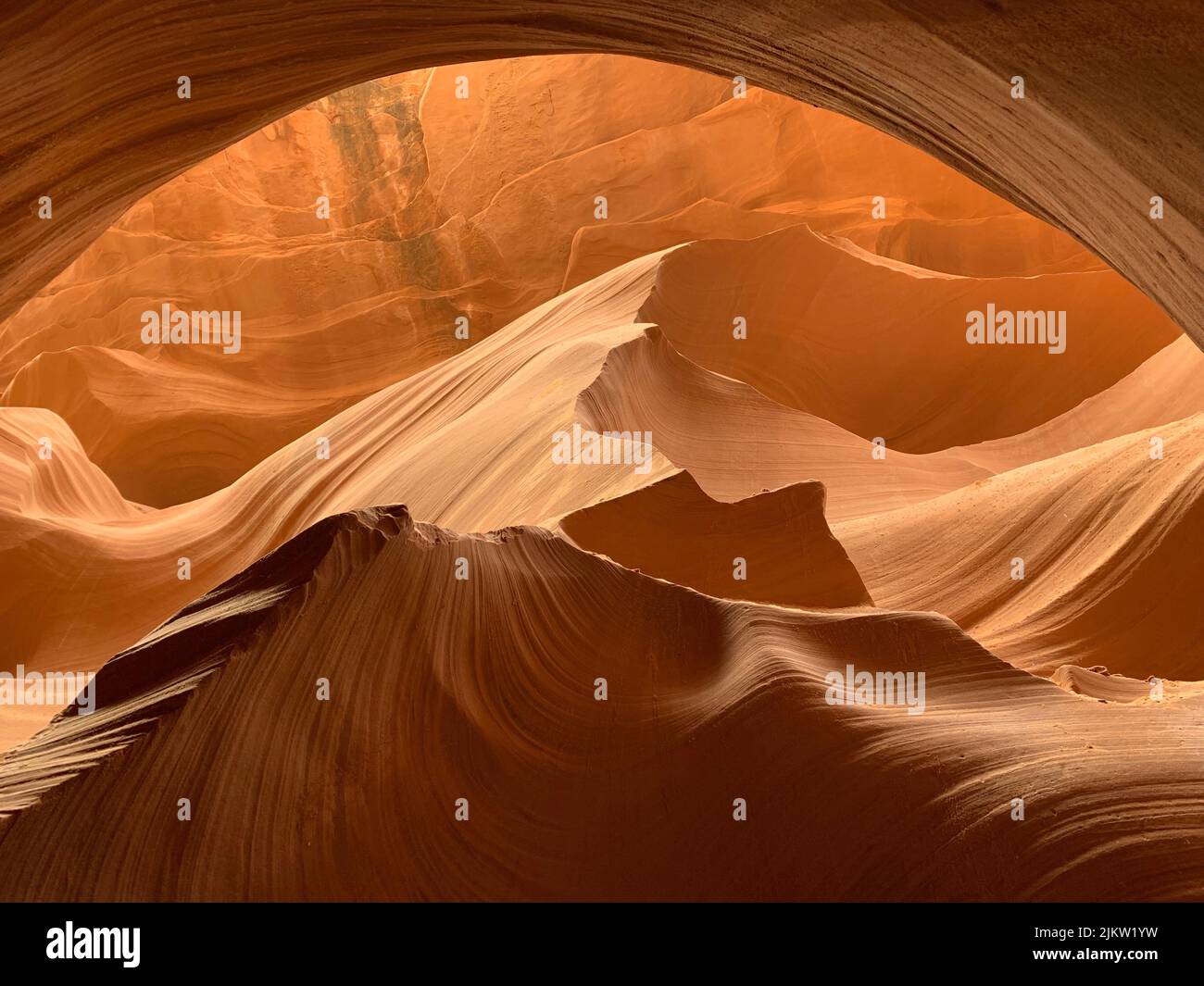 The orange sand dunes in the Lower Antelope Canyon in Arizona, United ...
