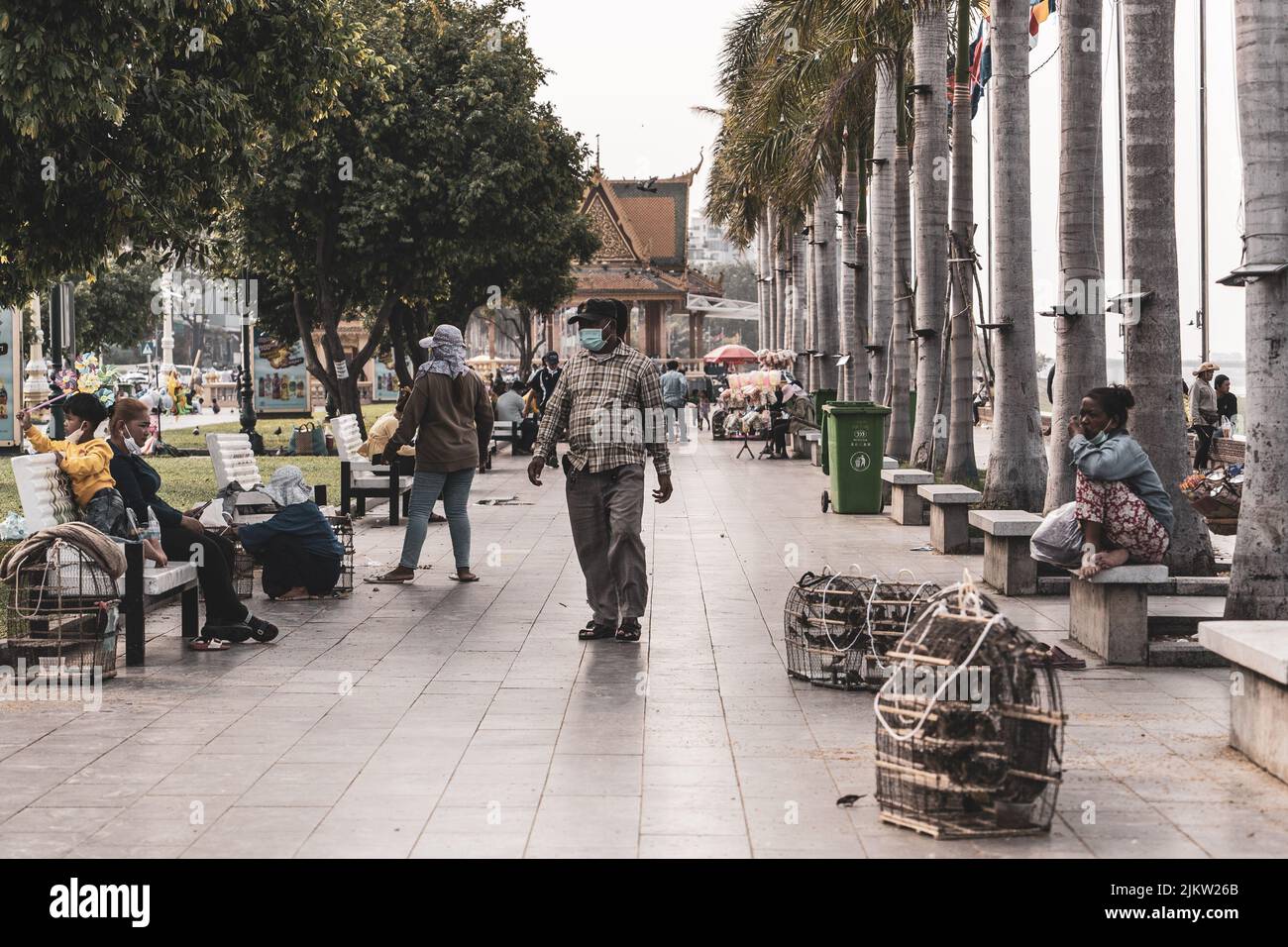 A street of small birds kept in cages near shrines for a merit release ...