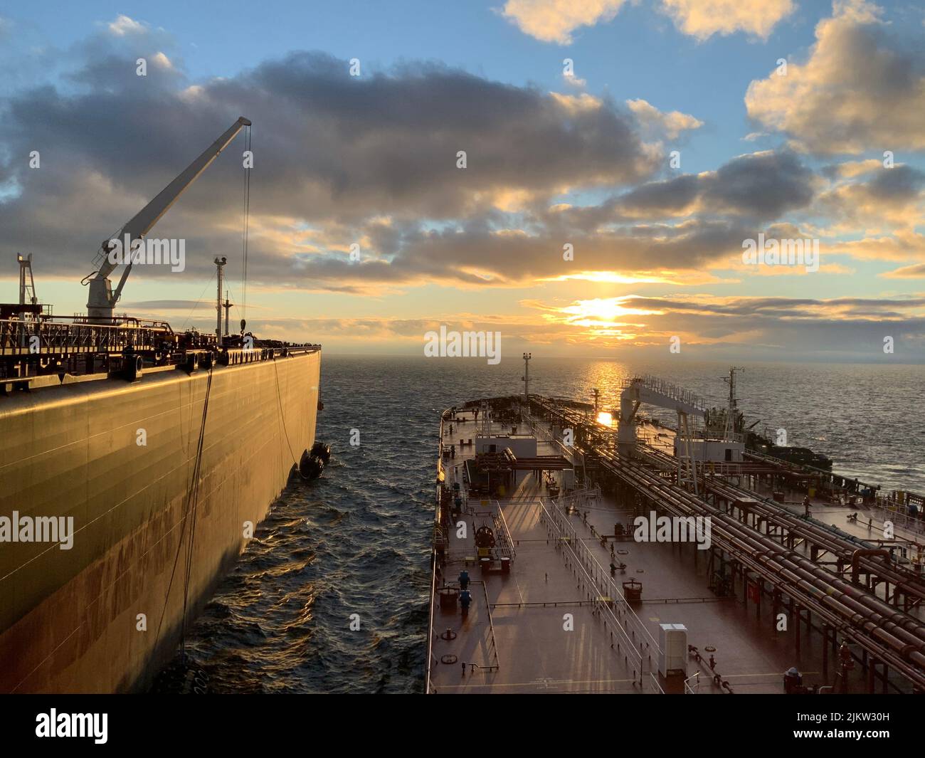 Two huge ships next to each other in the ocean Stock Photo - Alamy