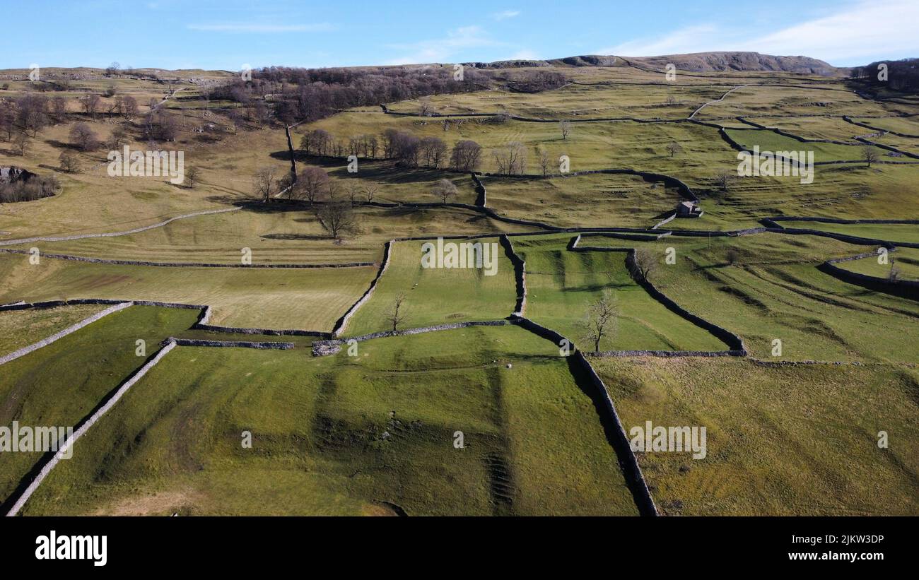 An aerial shot of greenery field contours between Stainforth and ...