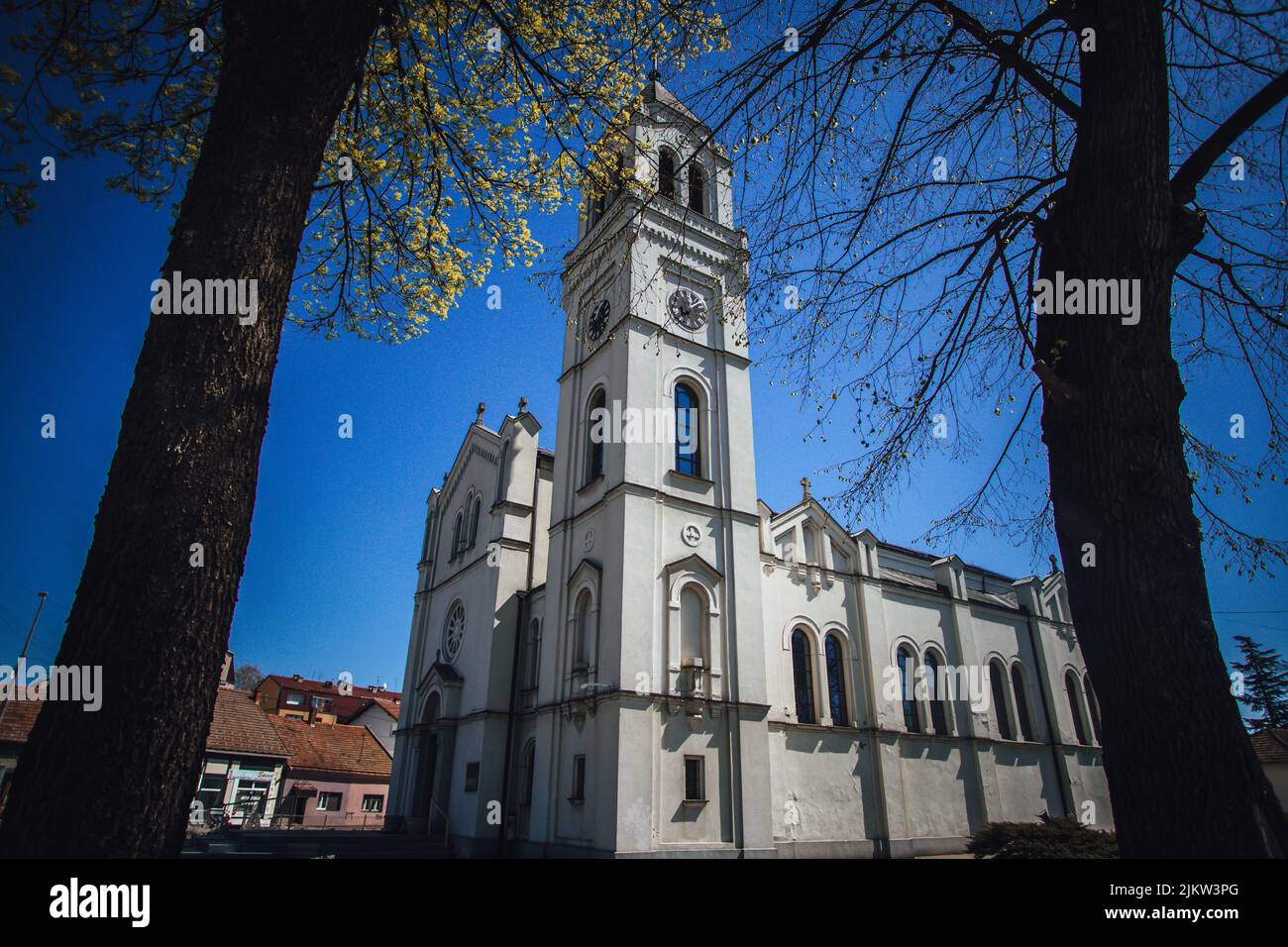 A low angle shot of the Exterior design of catholic church in Brcko ...
