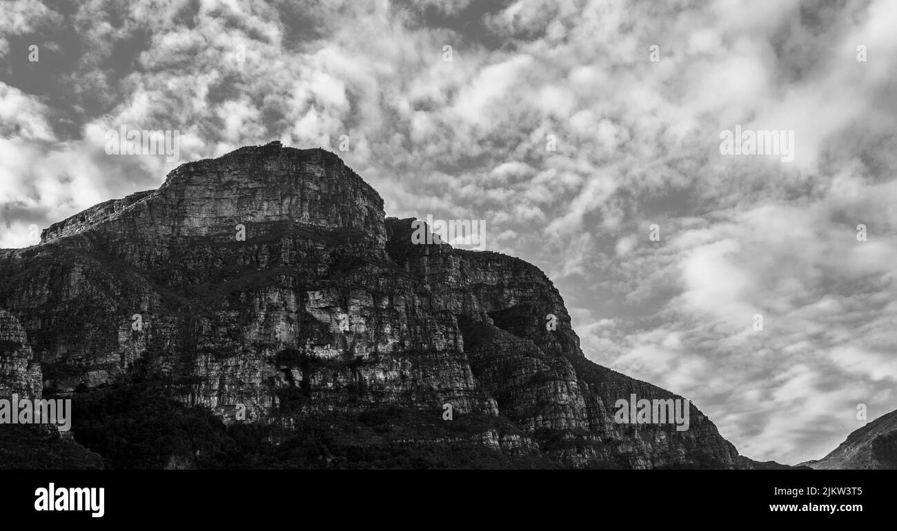 A greyscale shot of a huge rock Stock Photo - Alamy
