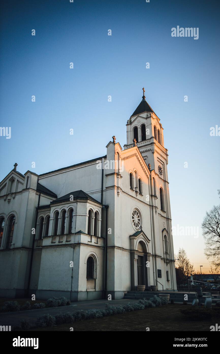 A vertical shot of the Exterior design of catholic church in Brcko with ...