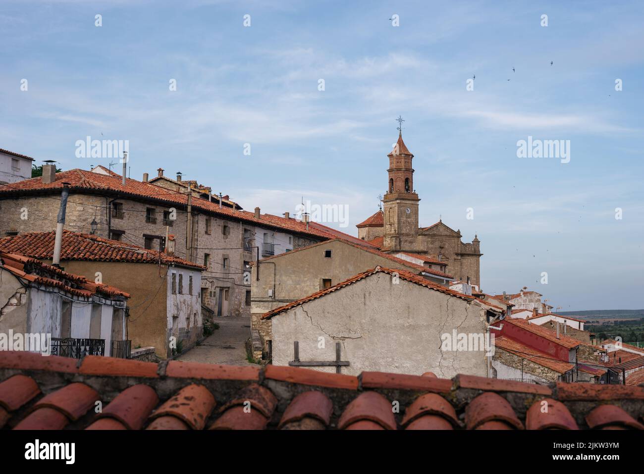 Panorama of roofs and church of a Spanish medieval town Stock Photo - Alamy