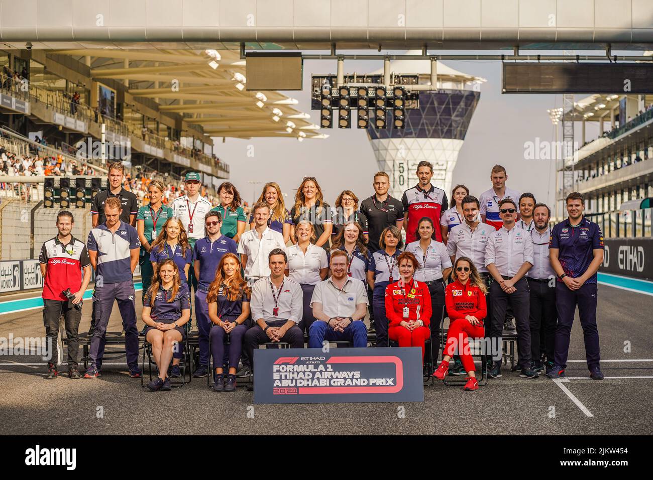 A group of people taking a picture at Formula 1 Grand Prix, Abu Dhabi ...