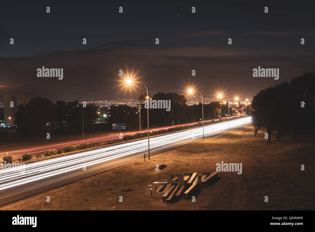 A beautiful shot of an empty road at night Stock Photo - Alamy