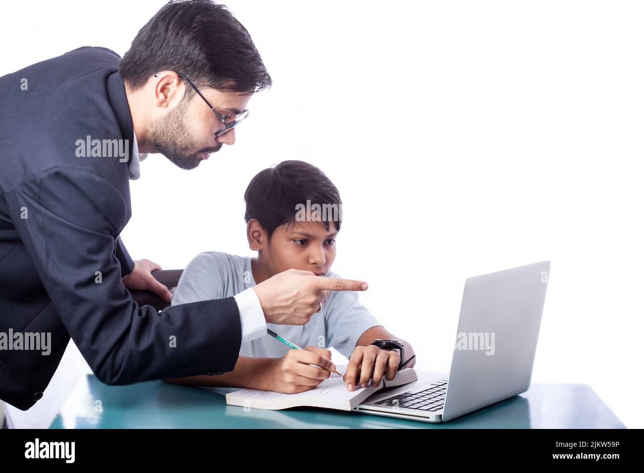 professor teaching teenage student to use computer in white background ...