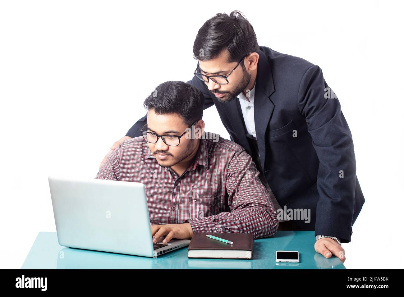 teacher helping student with learning computer education in isolated ...