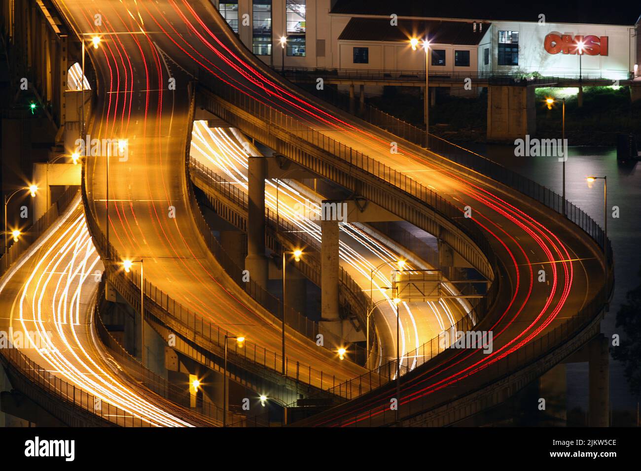 A scenic view of highway roads at night with traffic light trails Stock ...