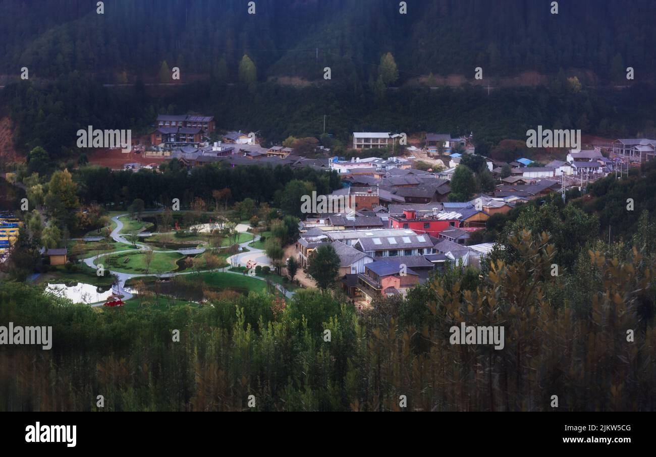 An aerial view of a small town with residential buildings and urban ...