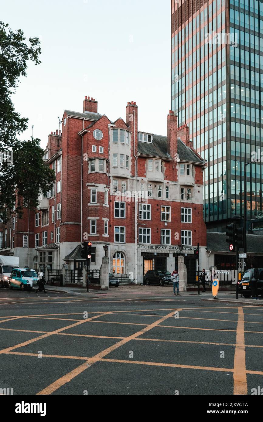 A vertical shot of a historic red building in London, UK Stock Photo ...