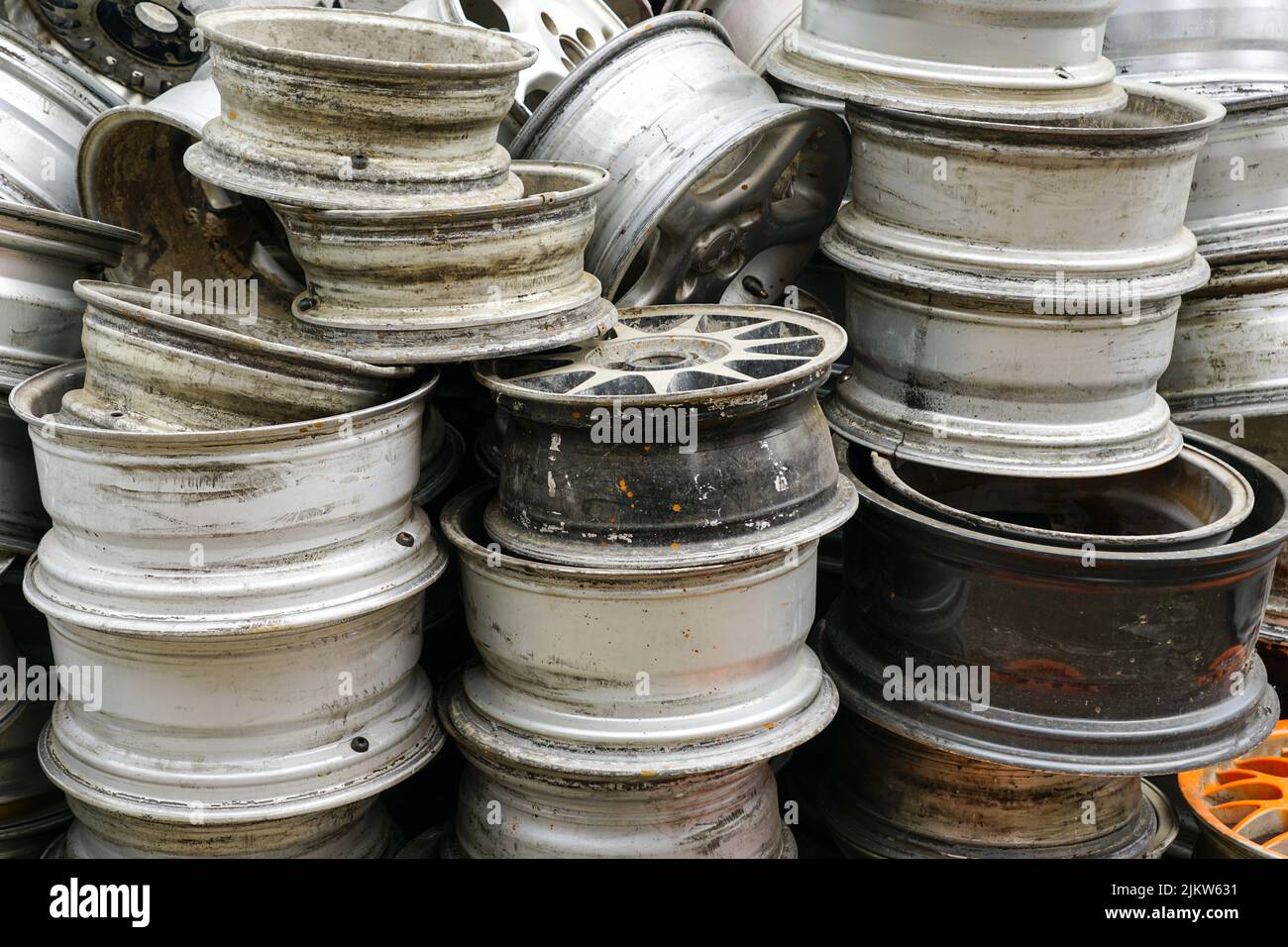 Many used alloy car wheels at a scrap metal purchasing company Stock ...