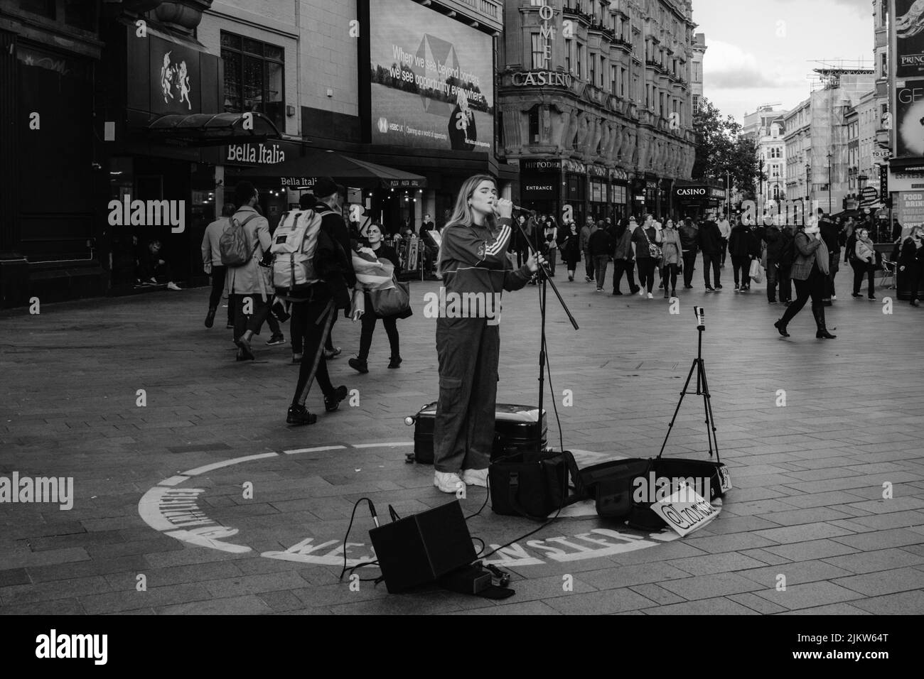 The people of London enjoying beautiful, sunny weather outside, while ...