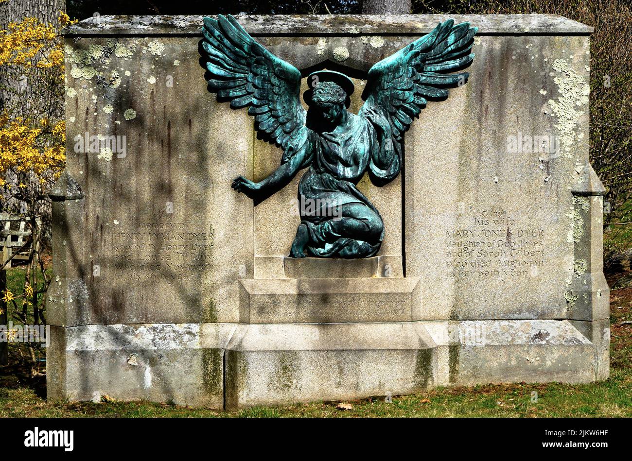 A headstone with the sculpture of an angel in Sleepy Hollow Cemetery in ...