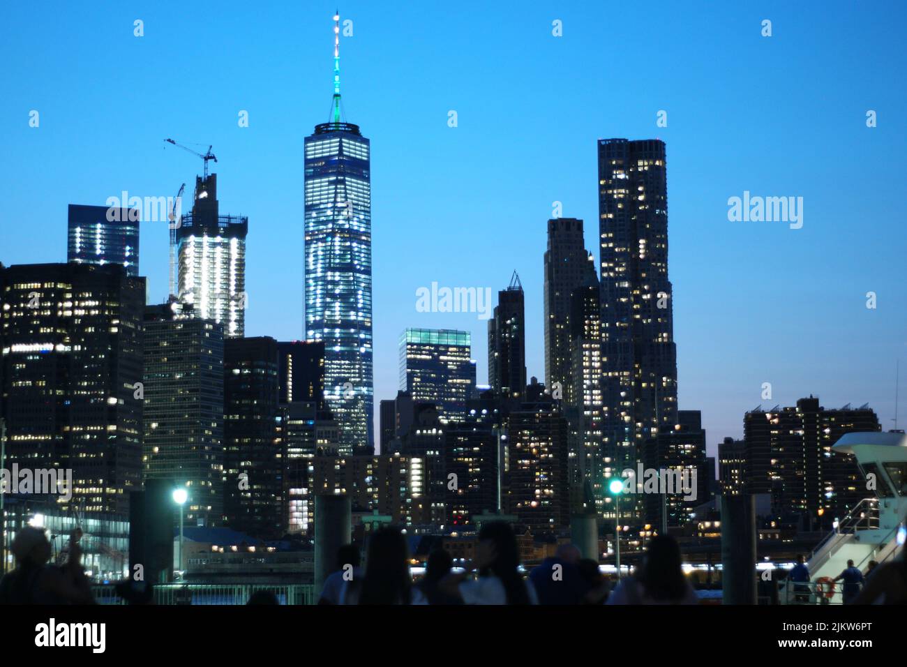 The New York City Skyline with One World Trade Center at sunset with ...