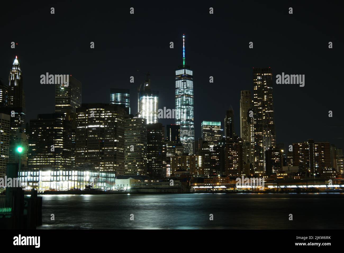 The New York City Skyline with One World Trade Center at sunset with ...