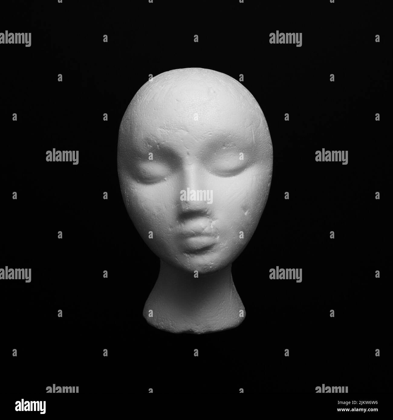 Foam prop head floating on a black background Stock Photo - Alamy