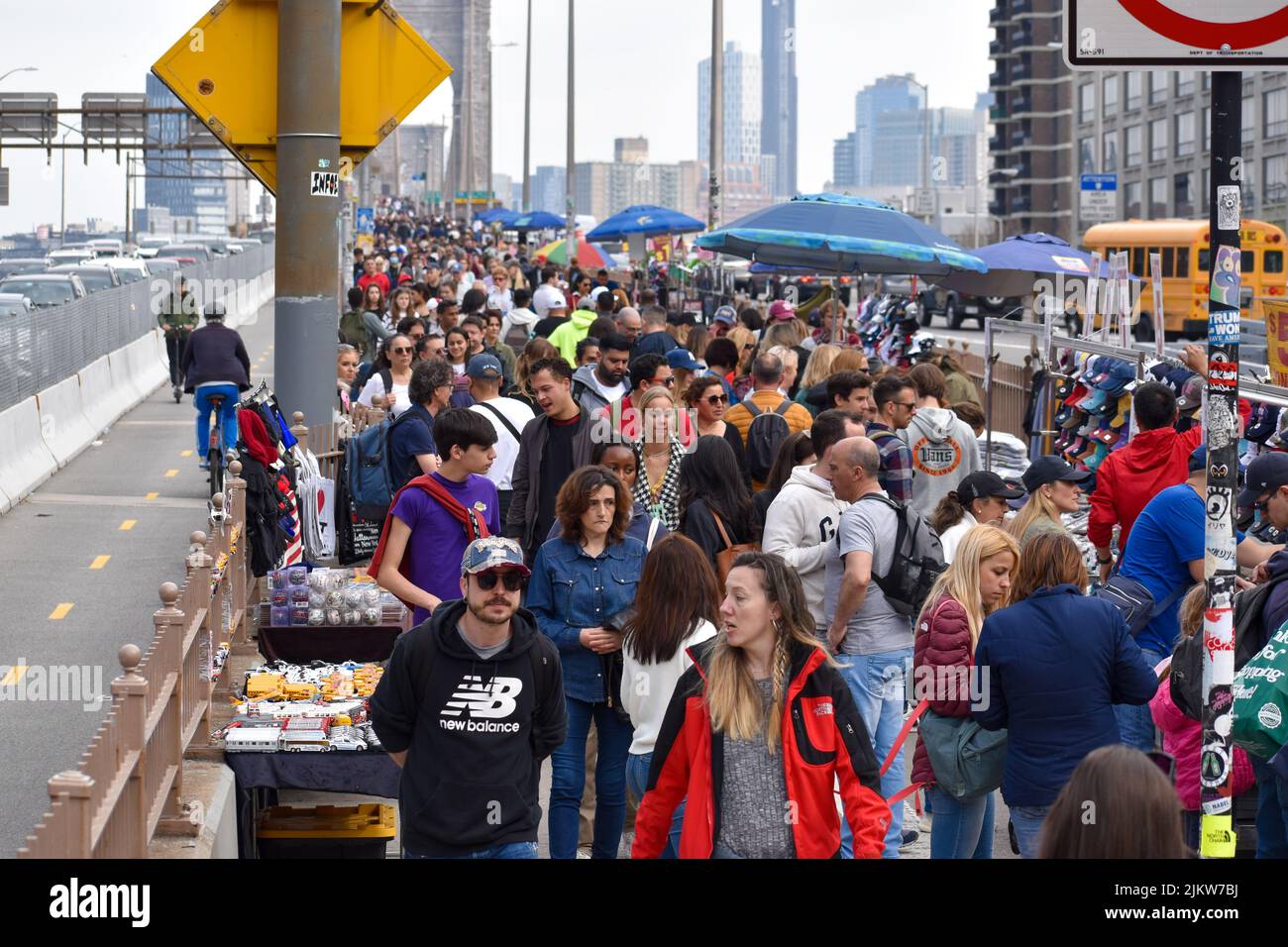 Tourists are coming back to New York City. A big crowd is seen walking ...