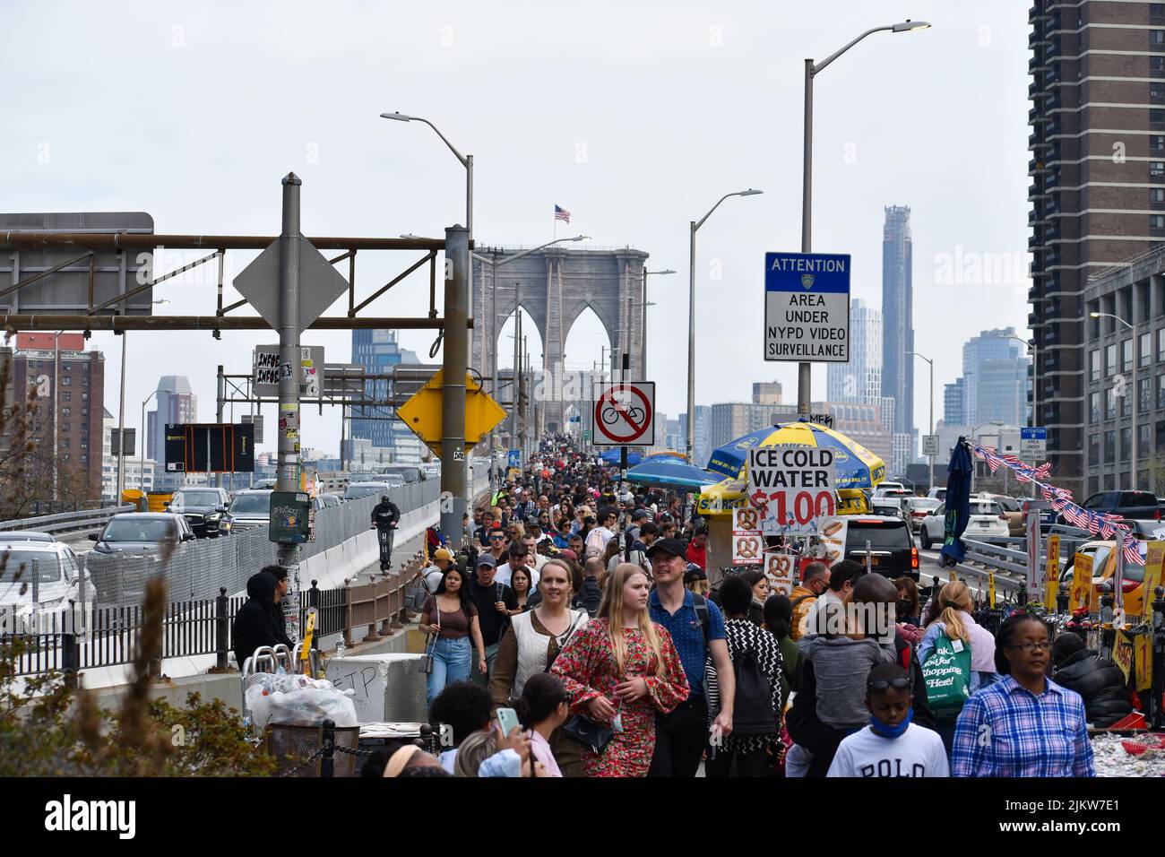 Tourists are coming back to New York City. A big crowd is seen walking ...