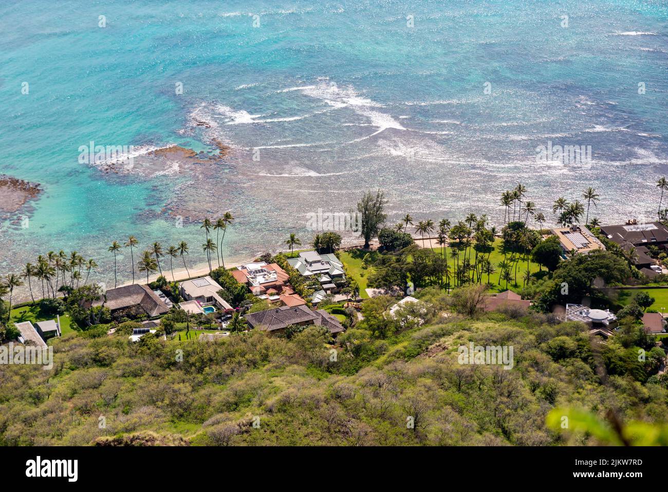 A beautiful view of a beach with modern houses in Waikiki, Hawaii, USA ...