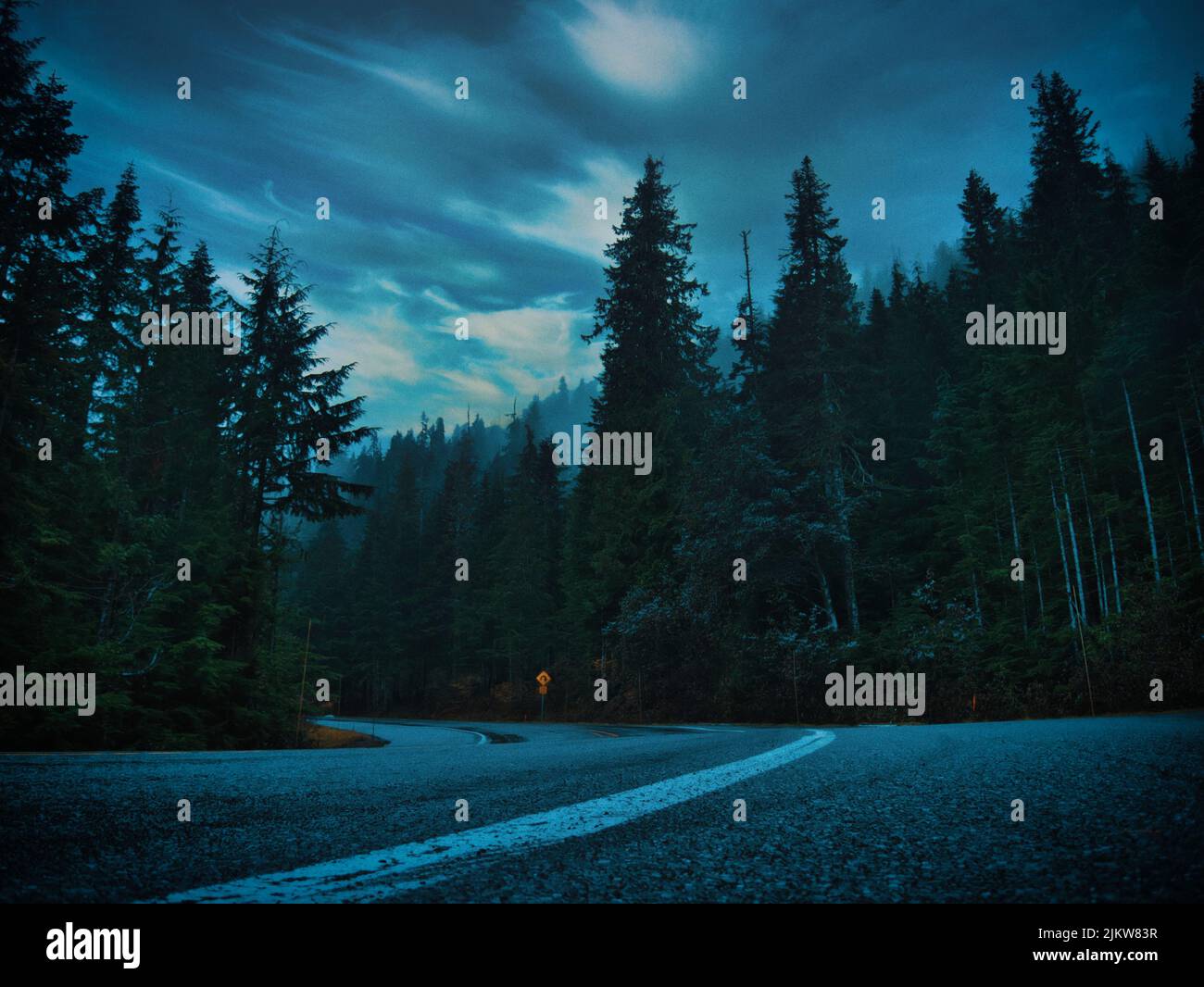 A scenic view at the Mount Baker Highway in Washington, USA under a ...