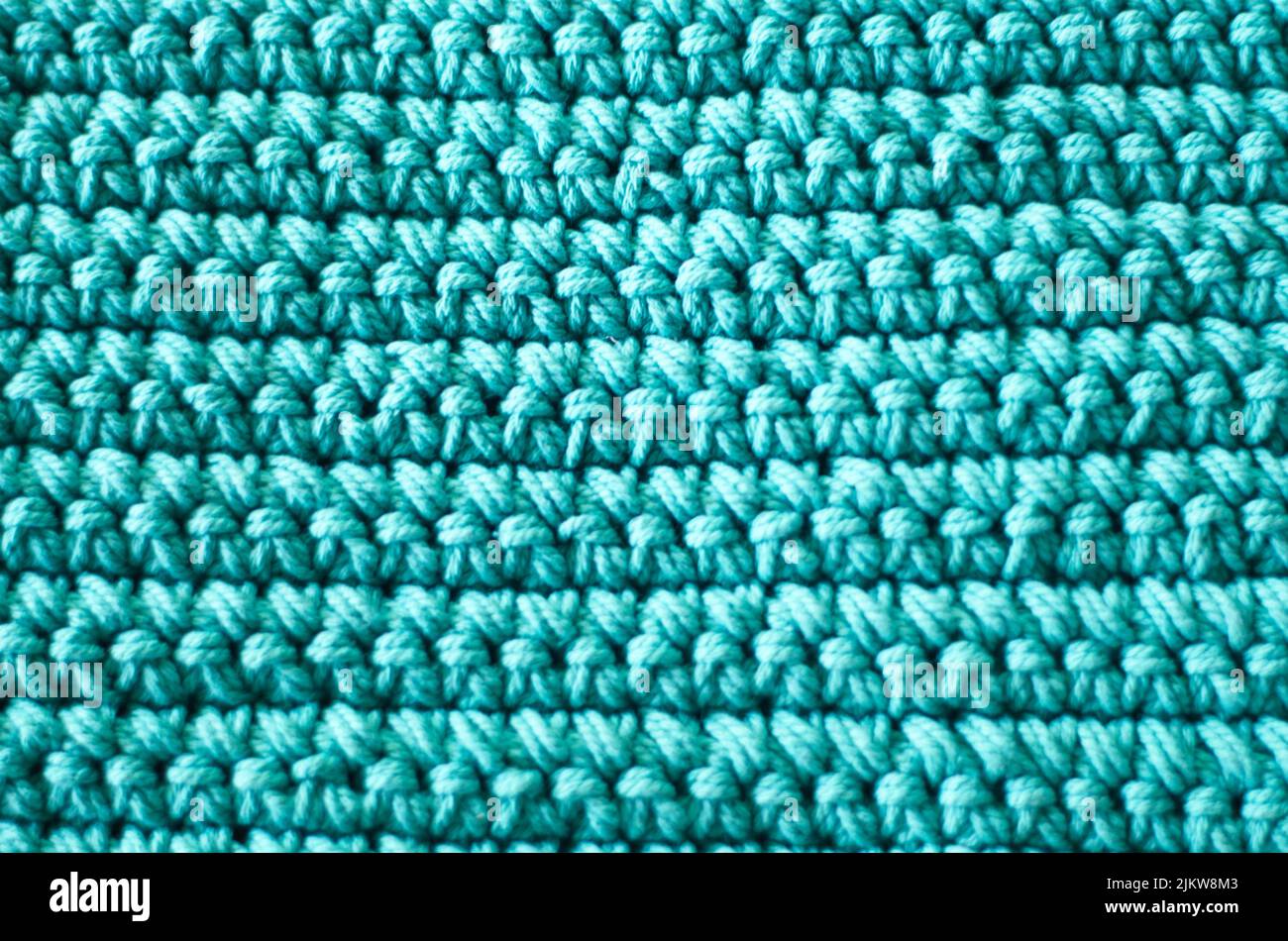 Full frame blue crochet pattern. Rope weaving crafts Stock Photo - Alamy