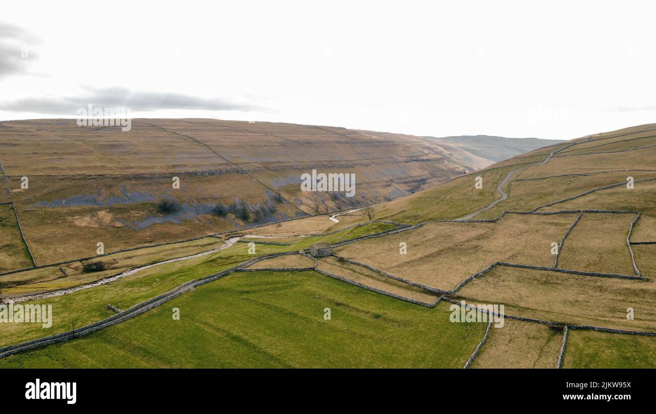An aerial view of the vast countryside area with fields and hills Stock ...