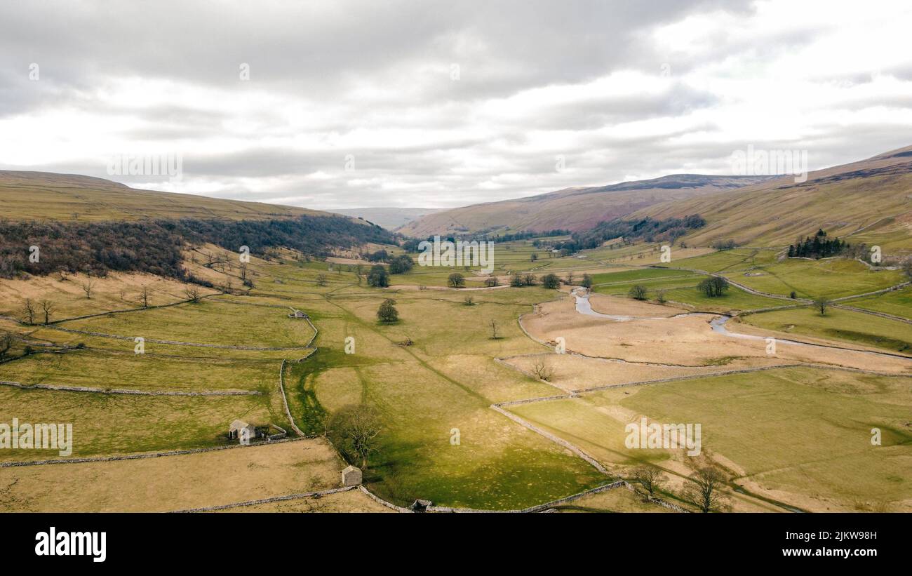 An aerial view of the vast countryside area with fields and hills Stock ...