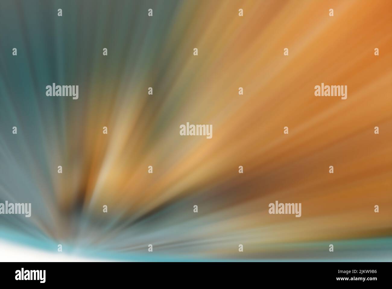 A starburst with blurry sparkles in orange and blue Stock Photo - Alamy