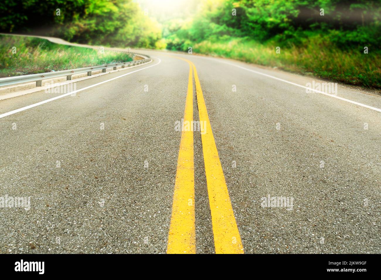 An empty street in the green countryside area Stock Photo - Alamy