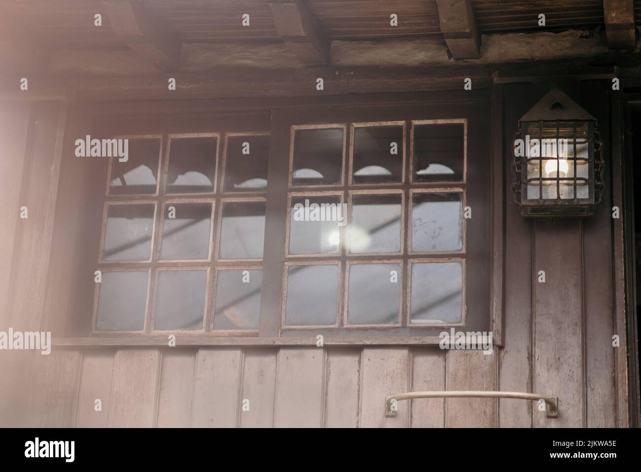 A closeup of a wooden building with a window Stock Photo - Alamy