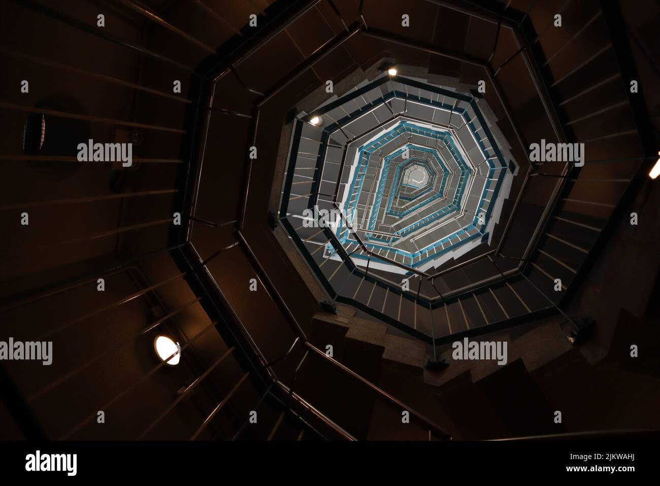 A closeup of a round staircase in a building Stock Photo - Alamy
