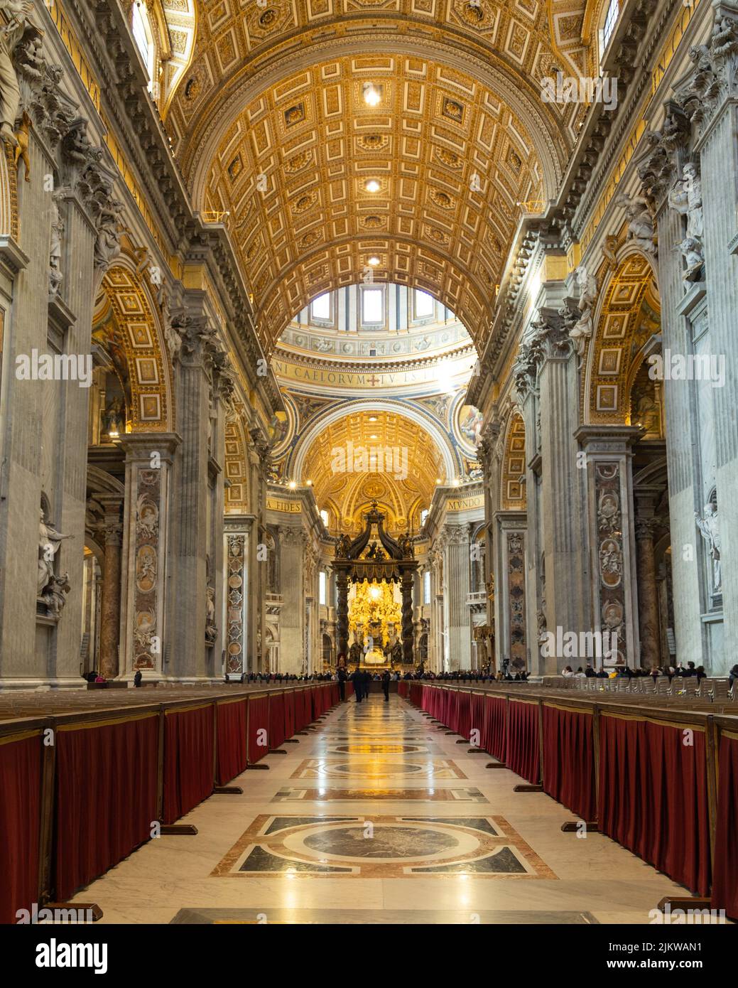 A vertical shot of the beautiful interior of The Papal Basilica of ...