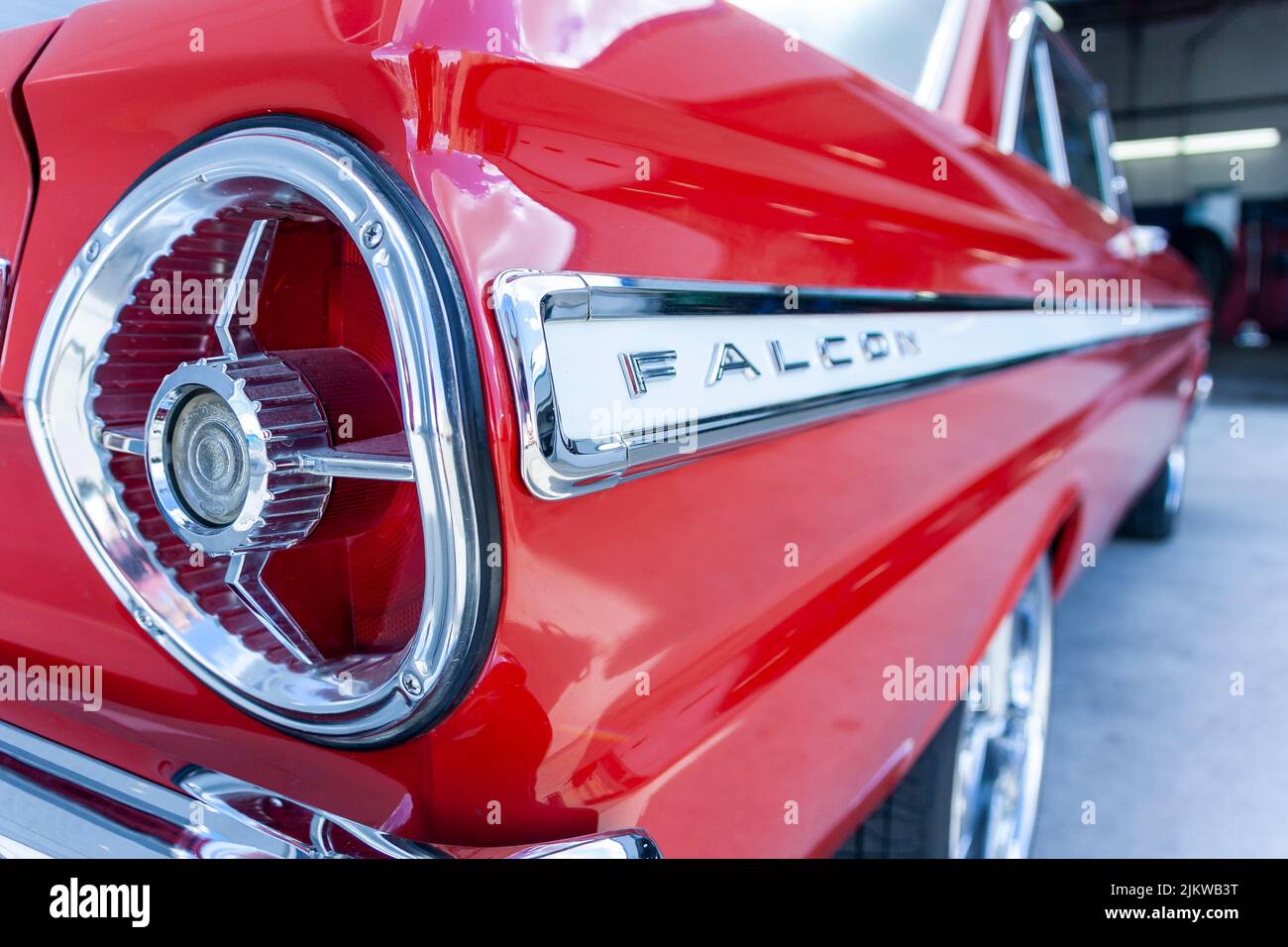 Bright Red Ford Falcon rear tail light and side emblem Stock Photo - Alamy