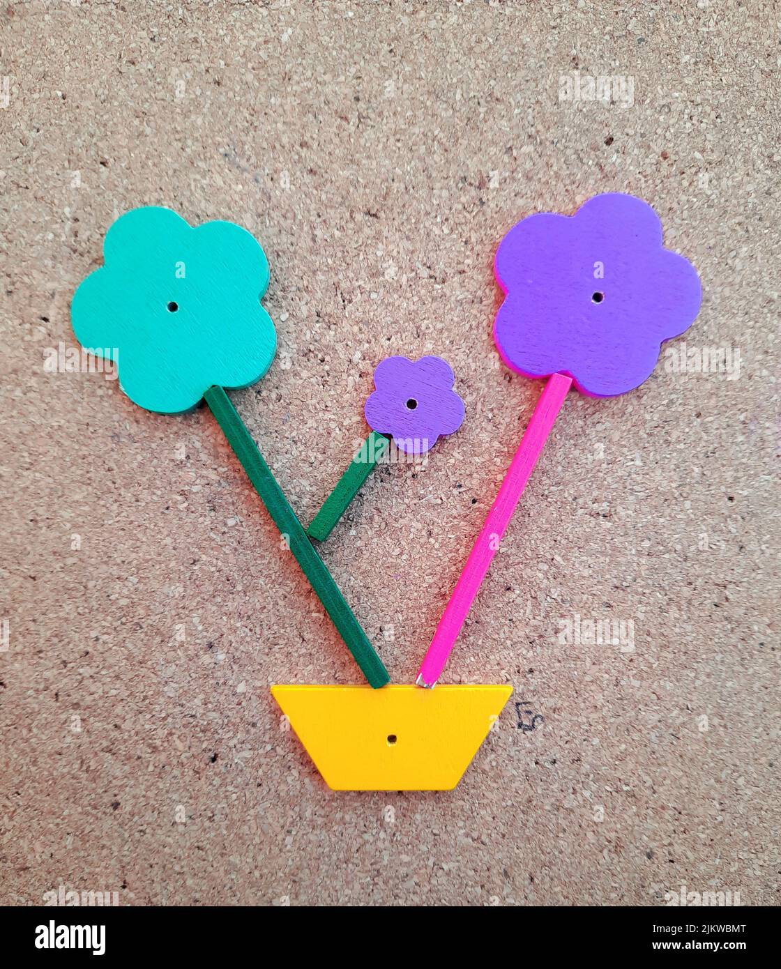 interesting flowers made of wood reminiscent of a small family Stock ...