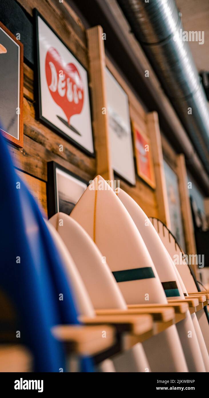 Various surfing boards in a surf shop Stock Photo - Alamy