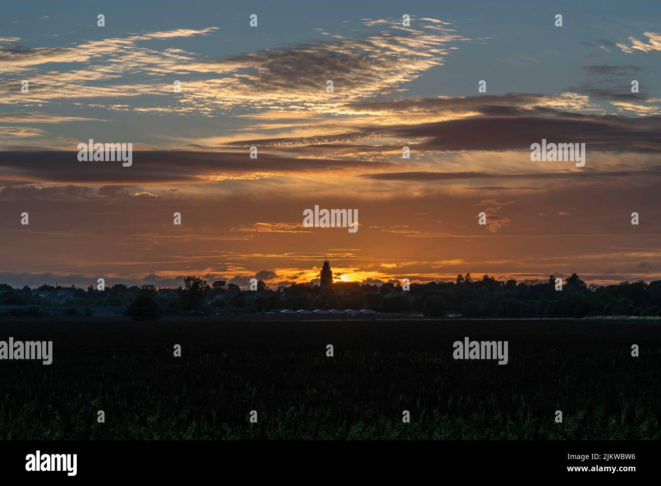 Sunset behind the village of Sutton-in-the-Isle, Cambridgeshire Stock ...
