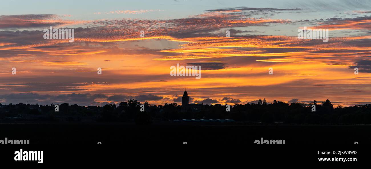 Sunset behind the village of Sutton-in-the-Isle, Cambridgeshire Stock ...