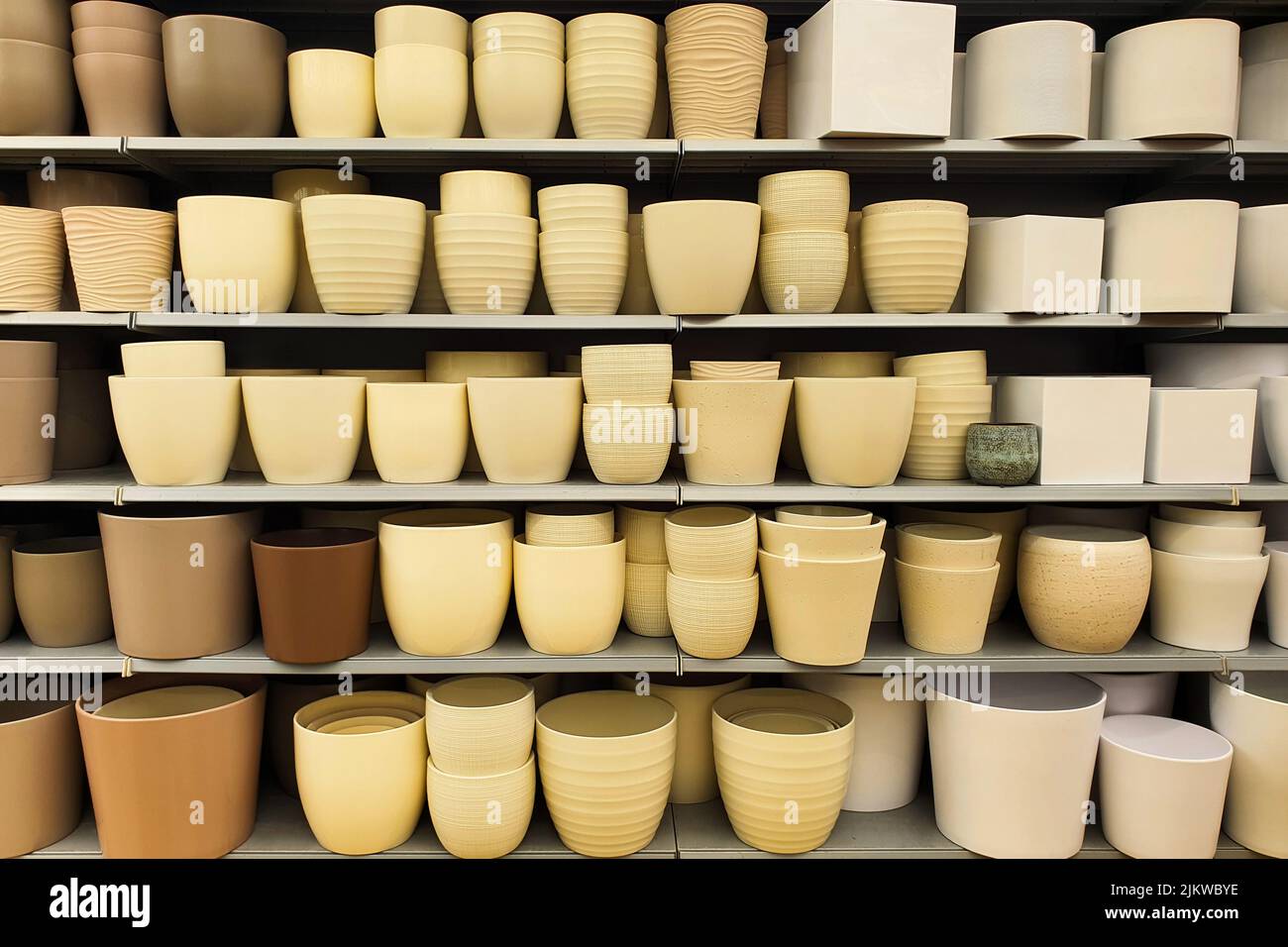 A variety of beige pots of different shapes Stock Photo - Alamy