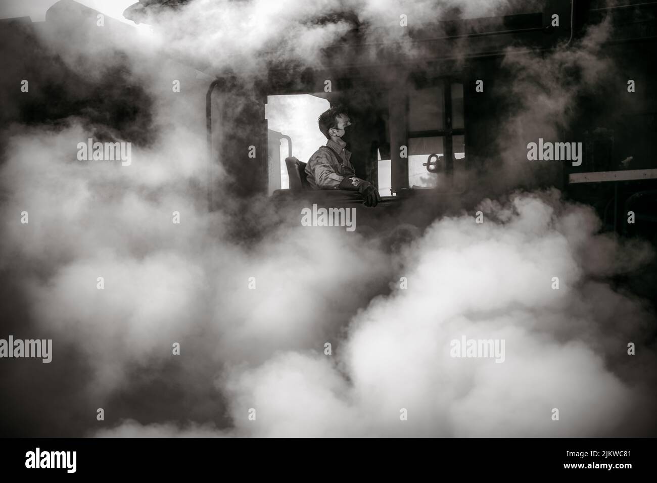 The steam engine retro vintage fireman, train Stock Photo - Alamy
