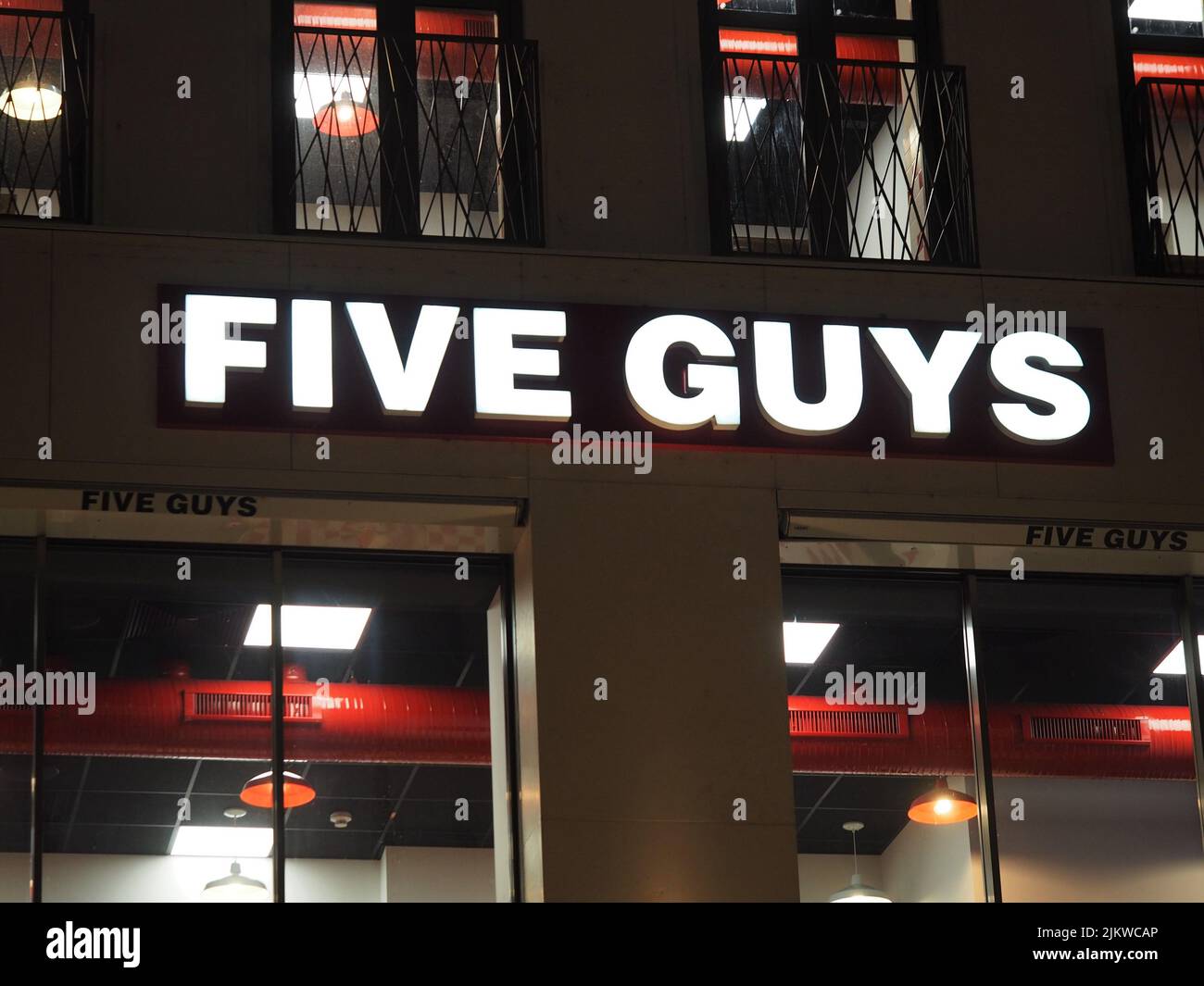 Five Guys sign at 1010 Vienna by night Stock Photo - Alamy