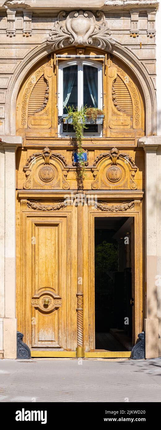 Paris, an ancient wooden door, typical building in the 16th ...