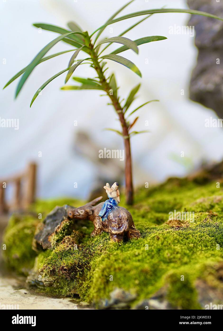 The figure of man on the grass Stock Photo - Alamy