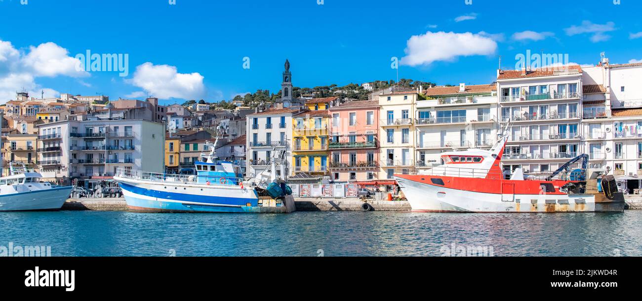 Sète in France, fisherboat at the quay, typical colorful facades Stock ...
